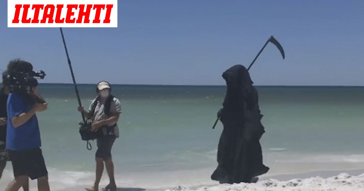 Viikatemies saapui koronarajoituksista vapautuneelle rannalle Floridassa