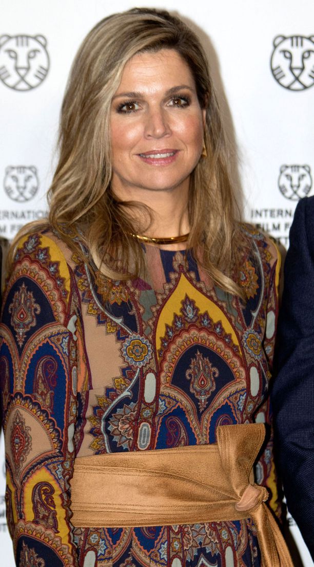 Kuningatar Maxima kohahdutti räikeässä haalarissa